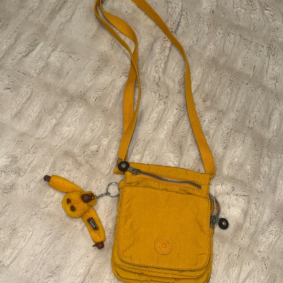 Kipling | Bags | Kipling Mustard Crossbody Bag With Monkey Charm | Poshmark